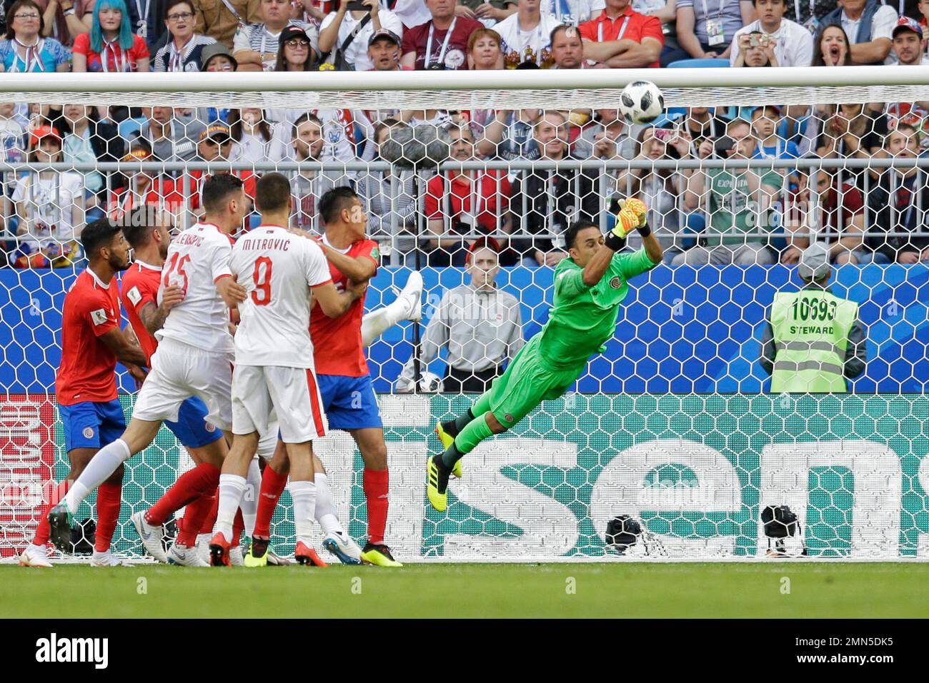 Costa Rica goalkeeper Keylor Navas, right, clears the ball during the ...