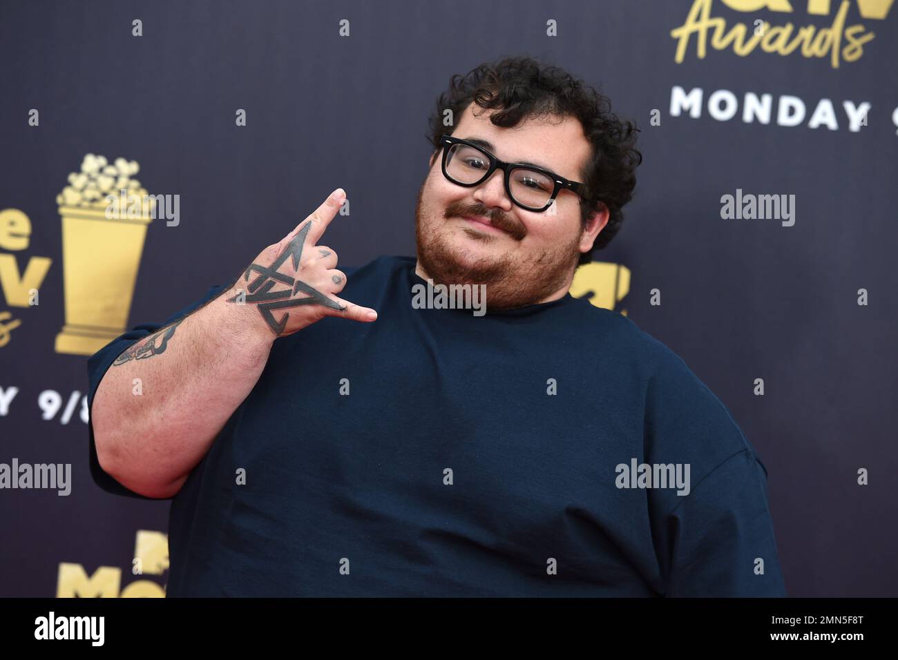 Jon Gabrus arrives at the MTV Movie and TV Awards at the Barker Hangar ...