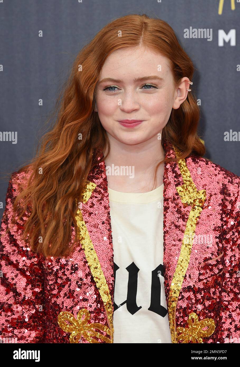 Sadie Sink arrives at the MTV Movie and TV Awards at the Barker Hangar ...