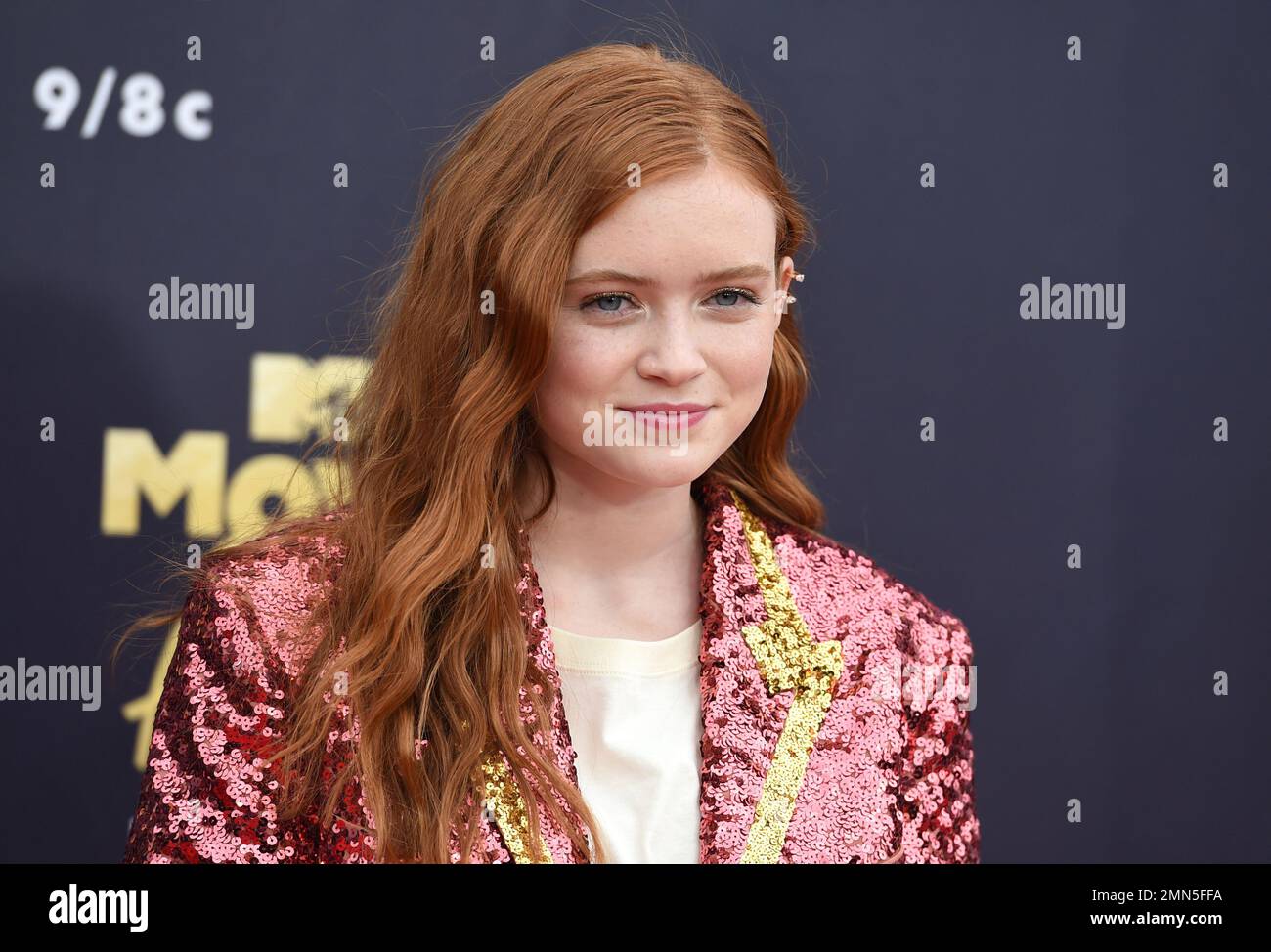 Sadie Sink arrives at the MTV Movie and TV Awards at the Barker Hangar ...