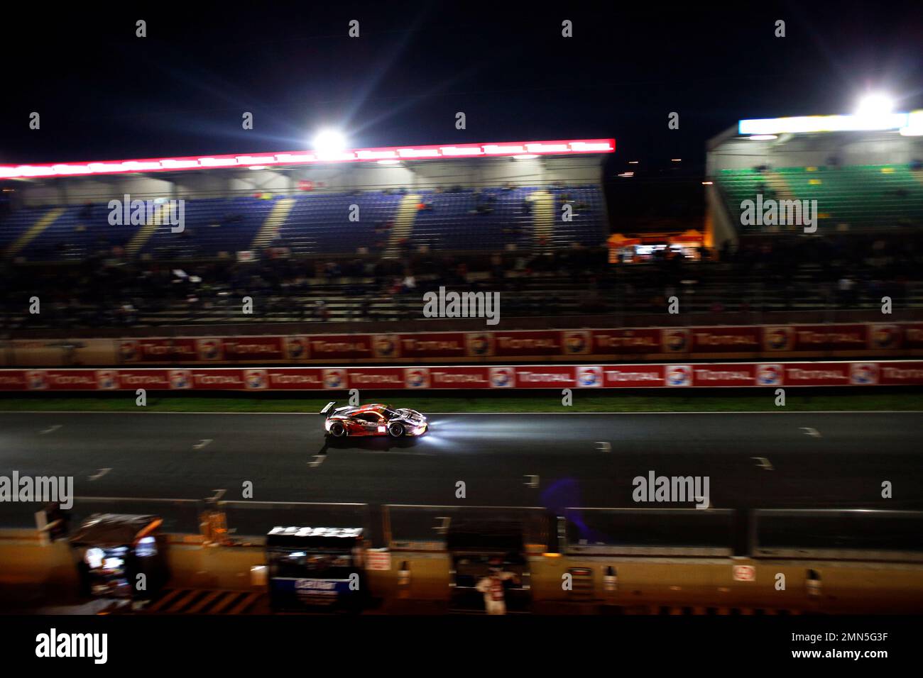 A car races on the race track during the 86th 24-hour Le Mans endurance ...