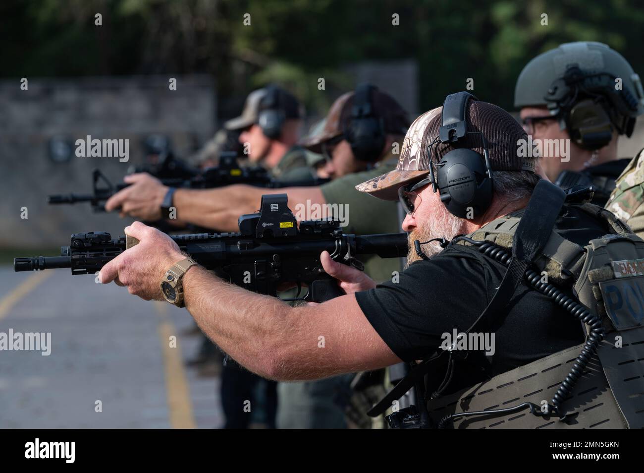 U.S. Police Officers assigned to the Special Weapons and Tactics (SWAT) teams from police ...