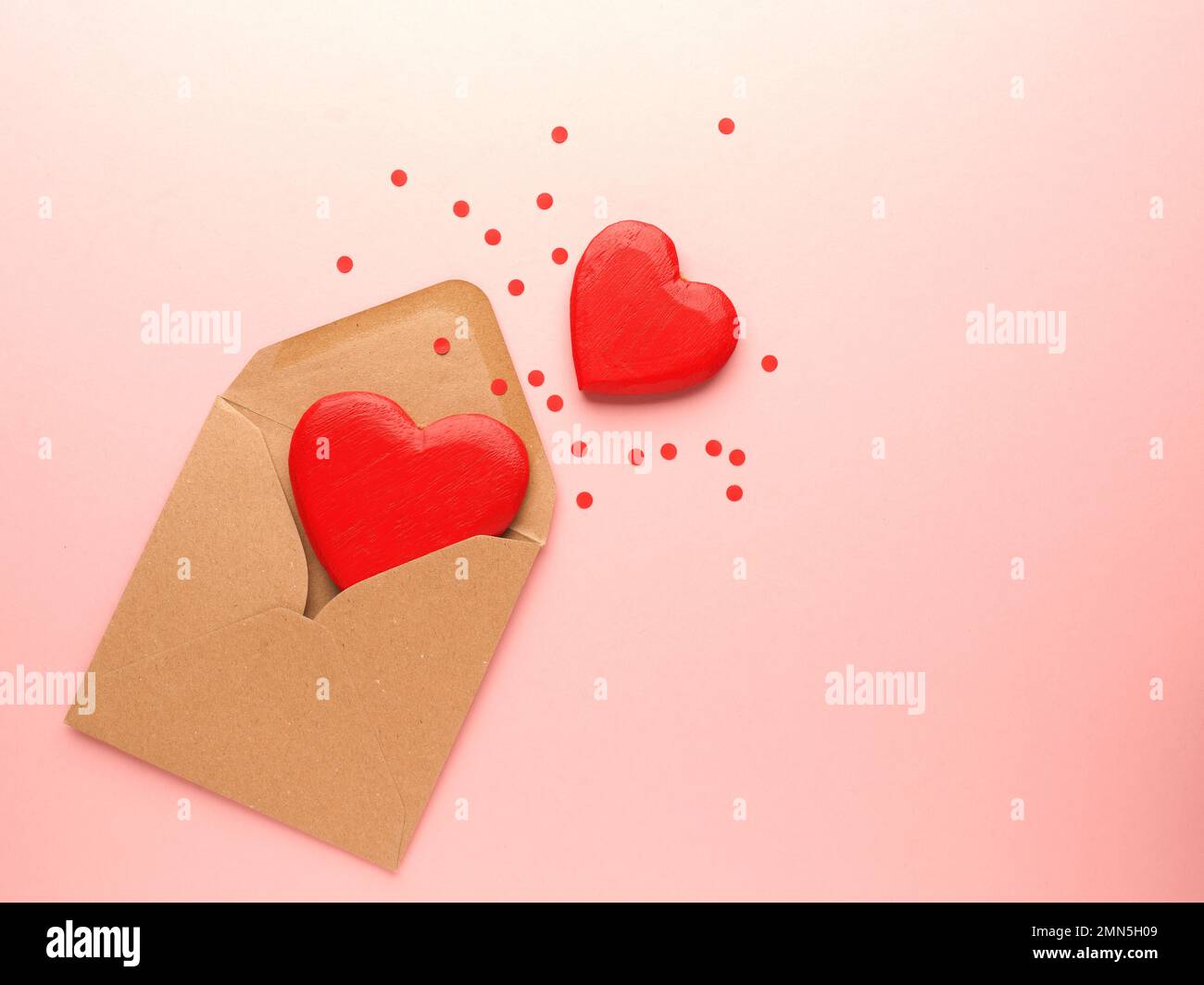 Red heart shapes on a pink background, Wedding or Valentines Day ...