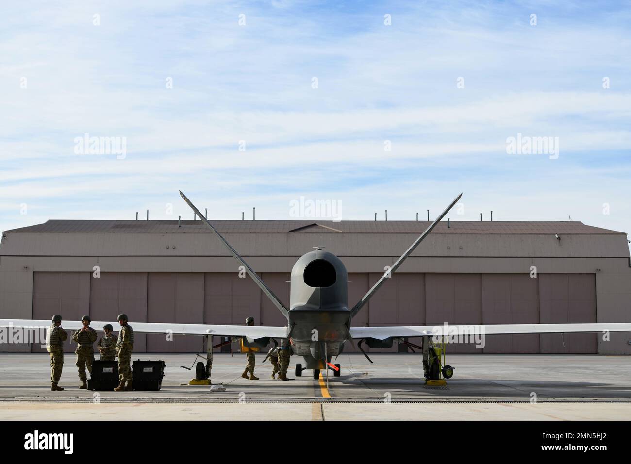 Airmen from the 319th Aircraft Maintenance Squadron perform a post ...