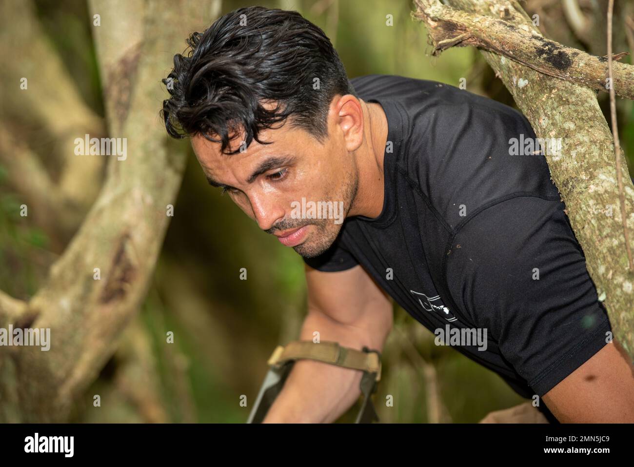 U.S. Marine Capt. Jon Tamanah, team leader assigned to the Defense POW ...