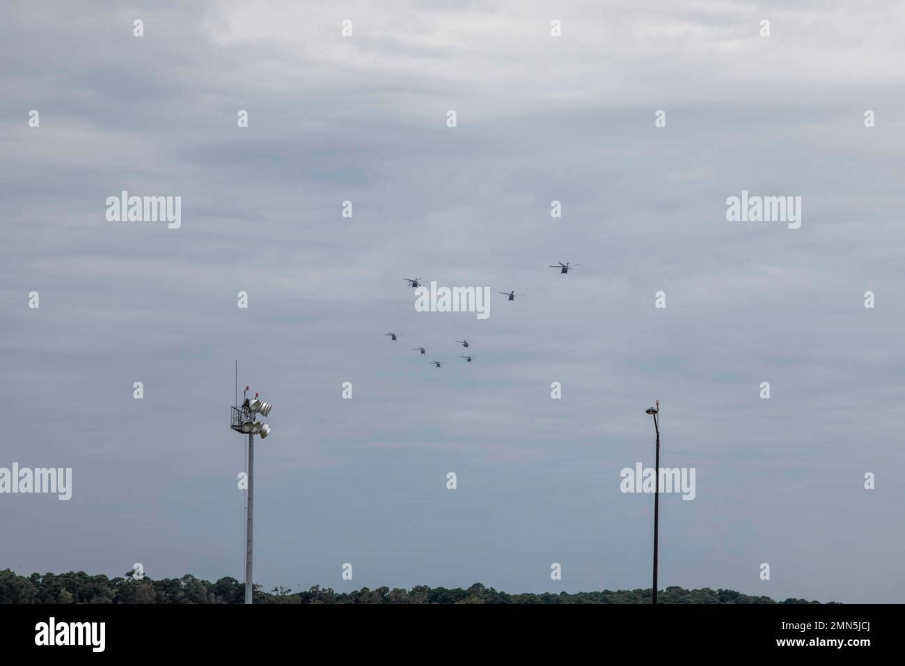 A fleet of UH-60 Black Hawk helicopters evacuate from Hunter Army ...