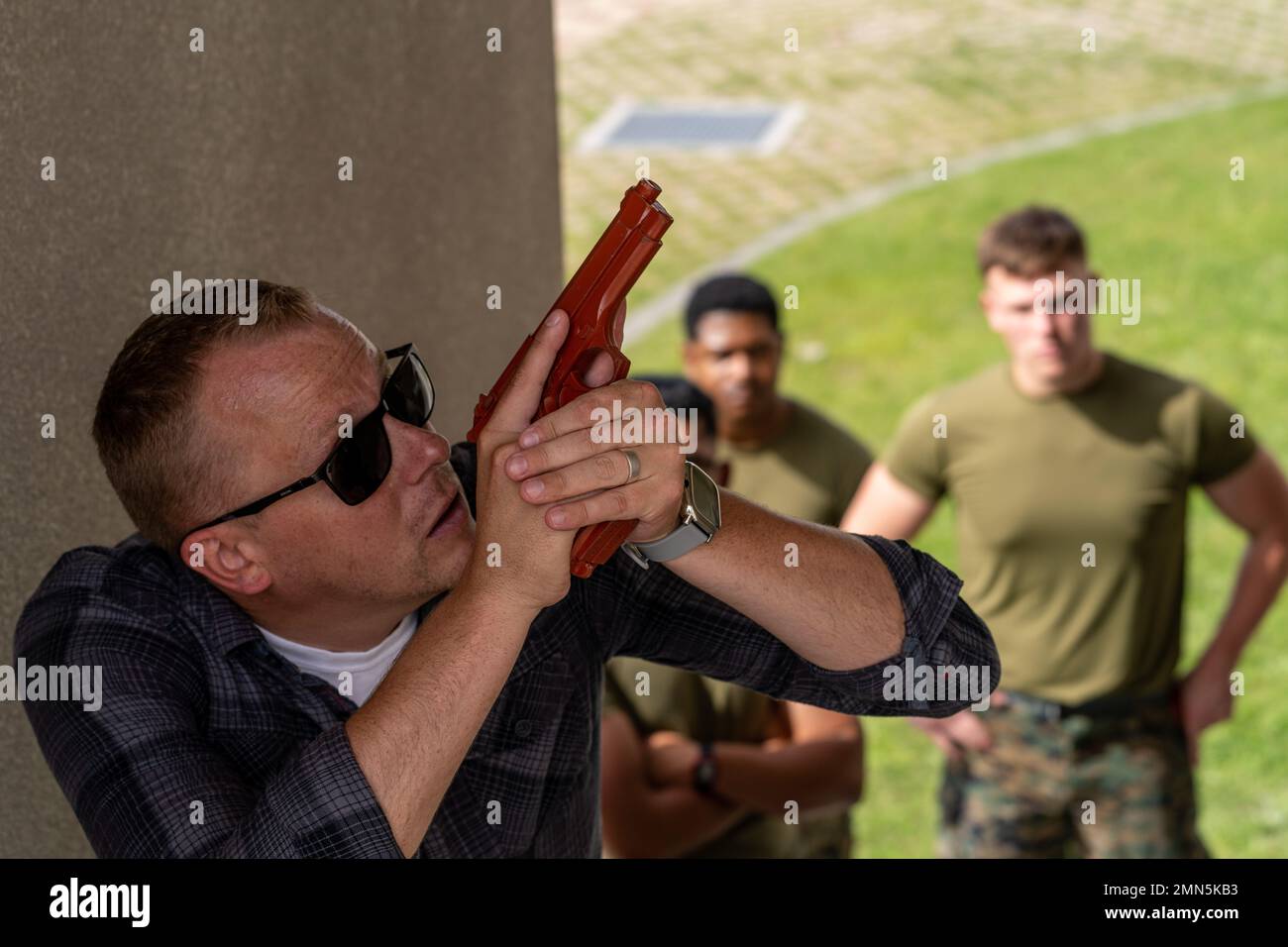 Robert Butterworth, a training Specialist for the Provost Marshal ...