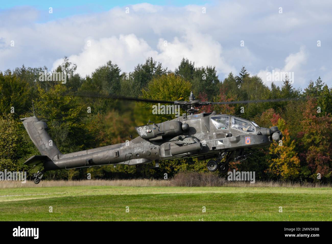 U.S. Soldiers assigned to 12th Combat Aviation Brigade hover over the ...