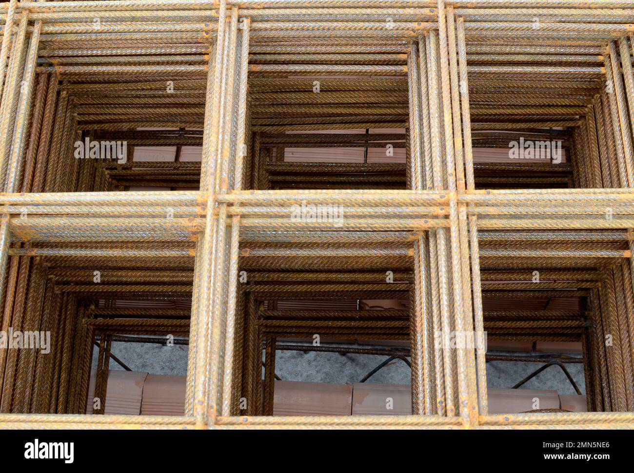 Stack of steel mesh for reinforced concrete construction Stock Photo ...
