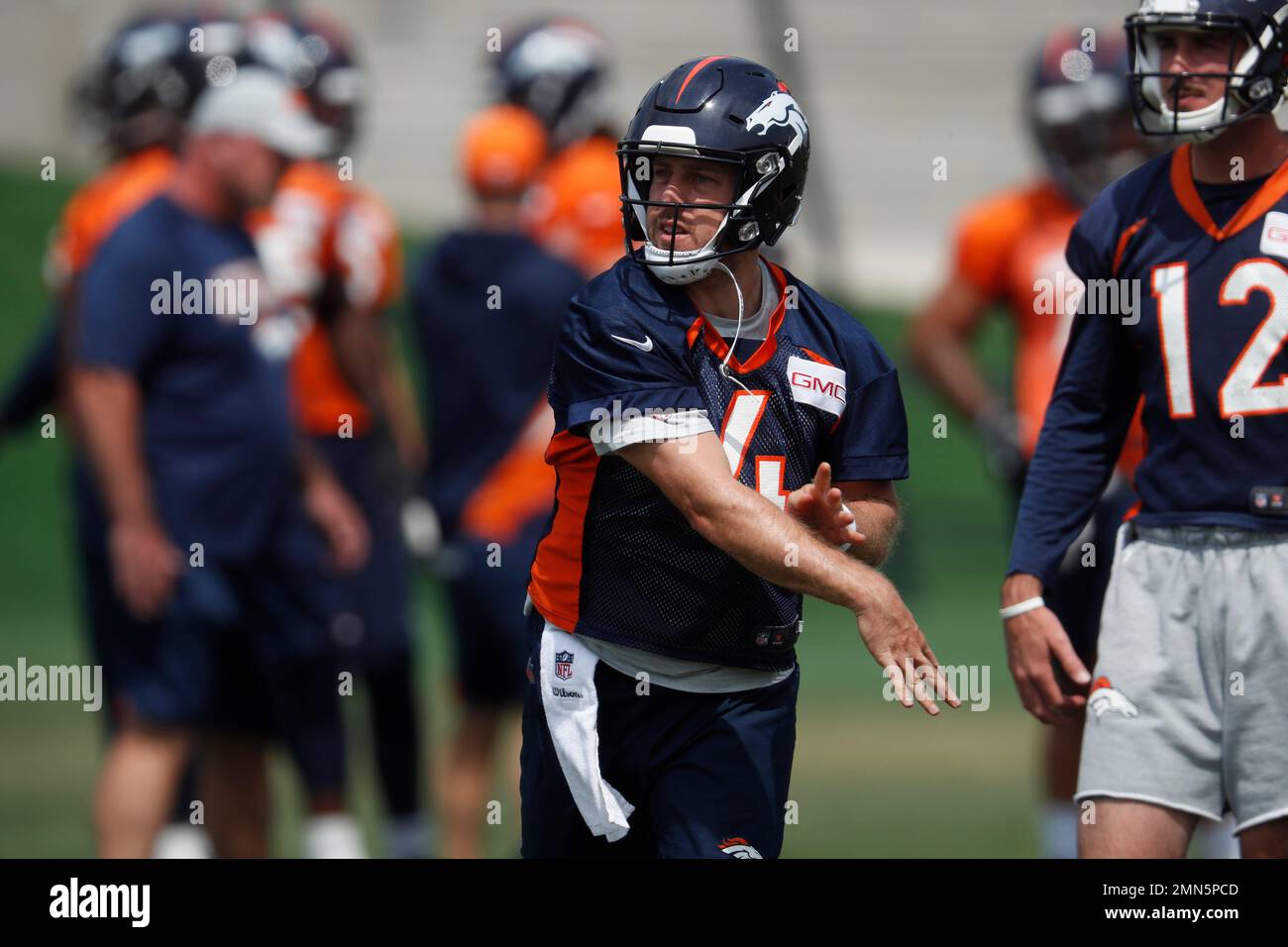 Denver Broncos quarterback Case Keenum (4) takes part in drills at the ...