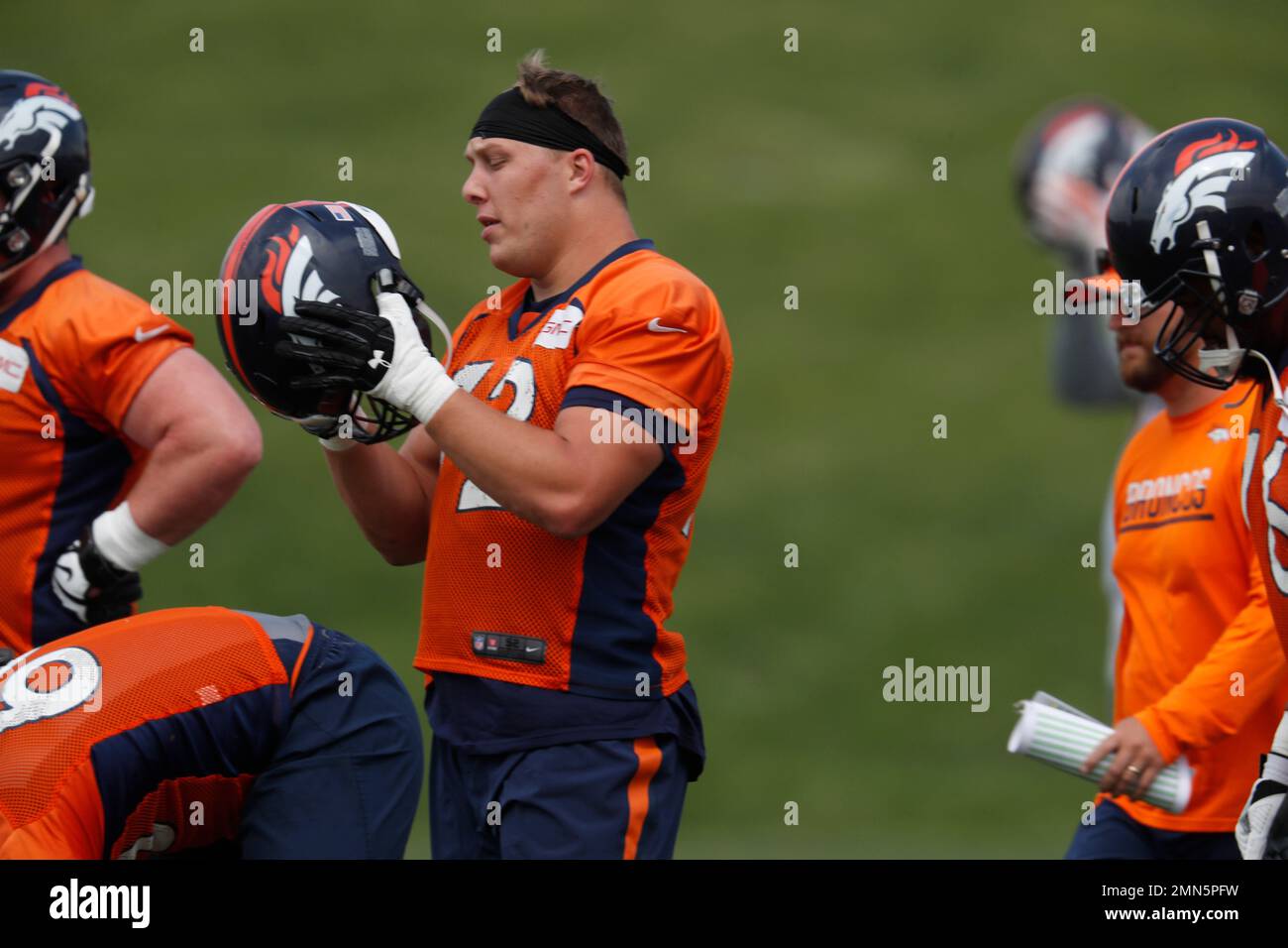 Denver Broncos offensive tackle Garett Bolles (72) takes part in drills ...