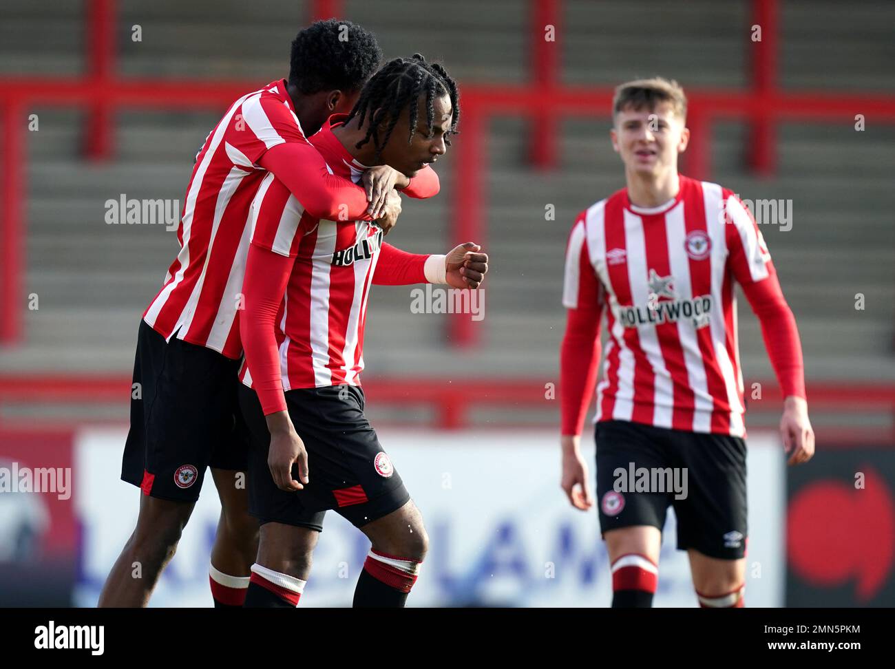 Brentford's J'Neil Bennett (centre) celebrates scoring the opening goal ...