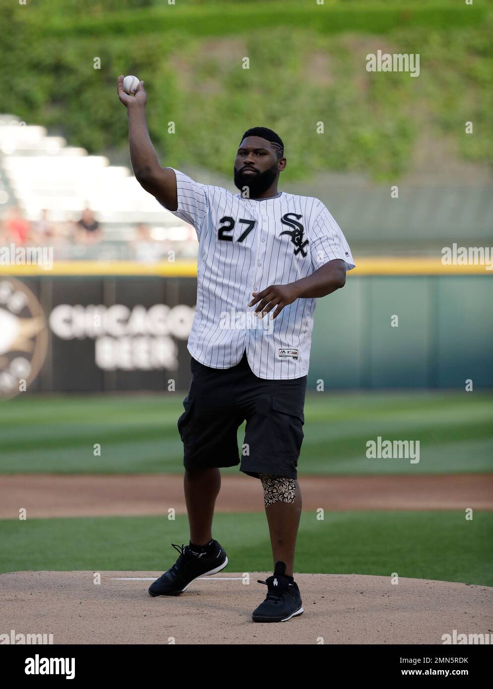 UFC fighter Curtis "Razor" Blades throws out a ceremonial first pitch ...