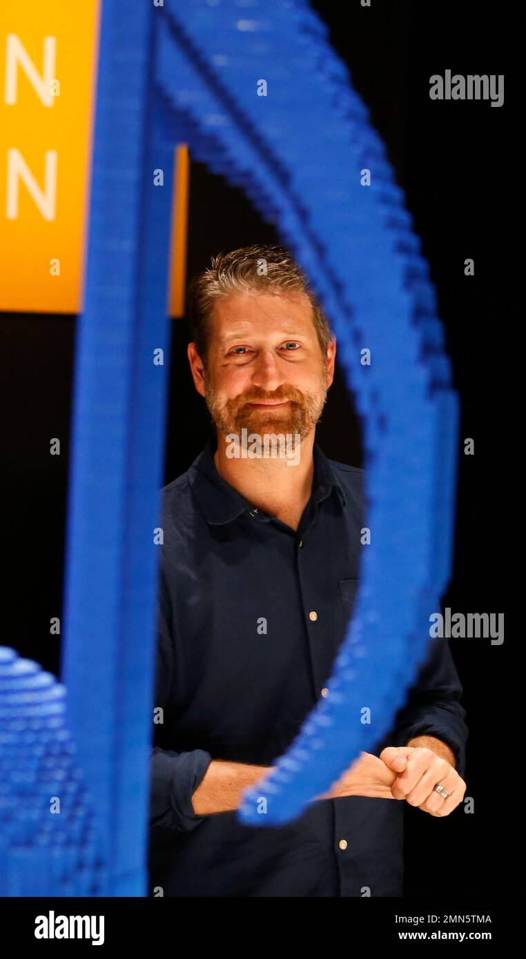 Lego artist Nathan Sawaya looks through one of the pieces in his ...