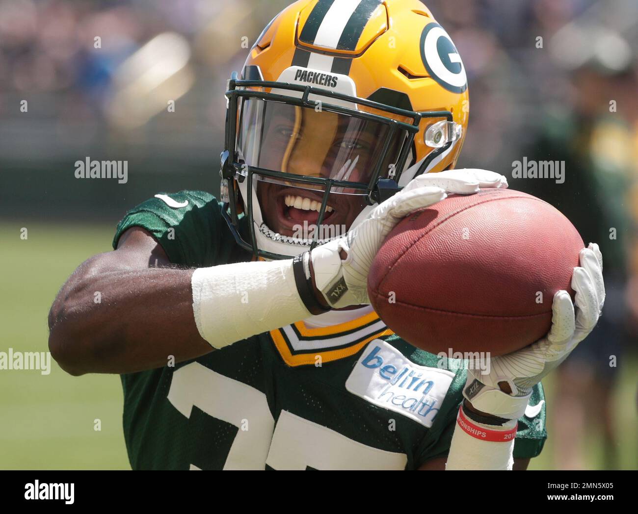 Green Bay Packers' Josh Jackson catches a ball during a practice ...