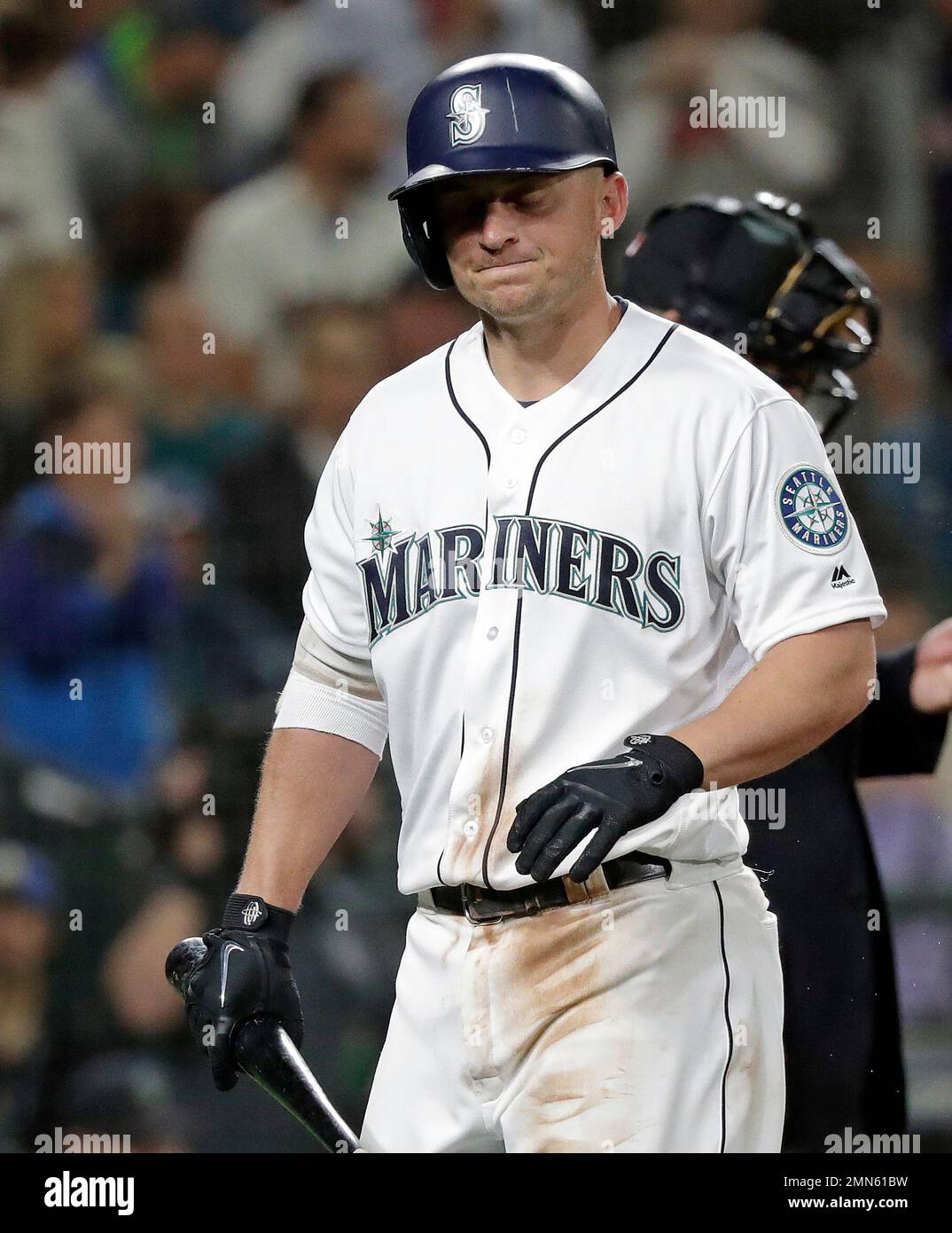 Seattle Mariners' Kyle Seager heads to the dugout after striking out ...