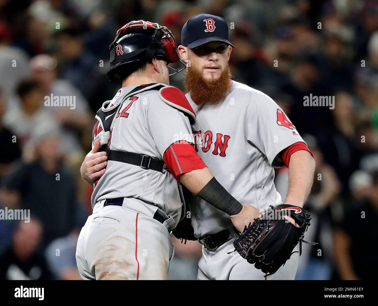 Boston Red Sox closing pitcher Craig Kimbrel, right, embraces catcher ...