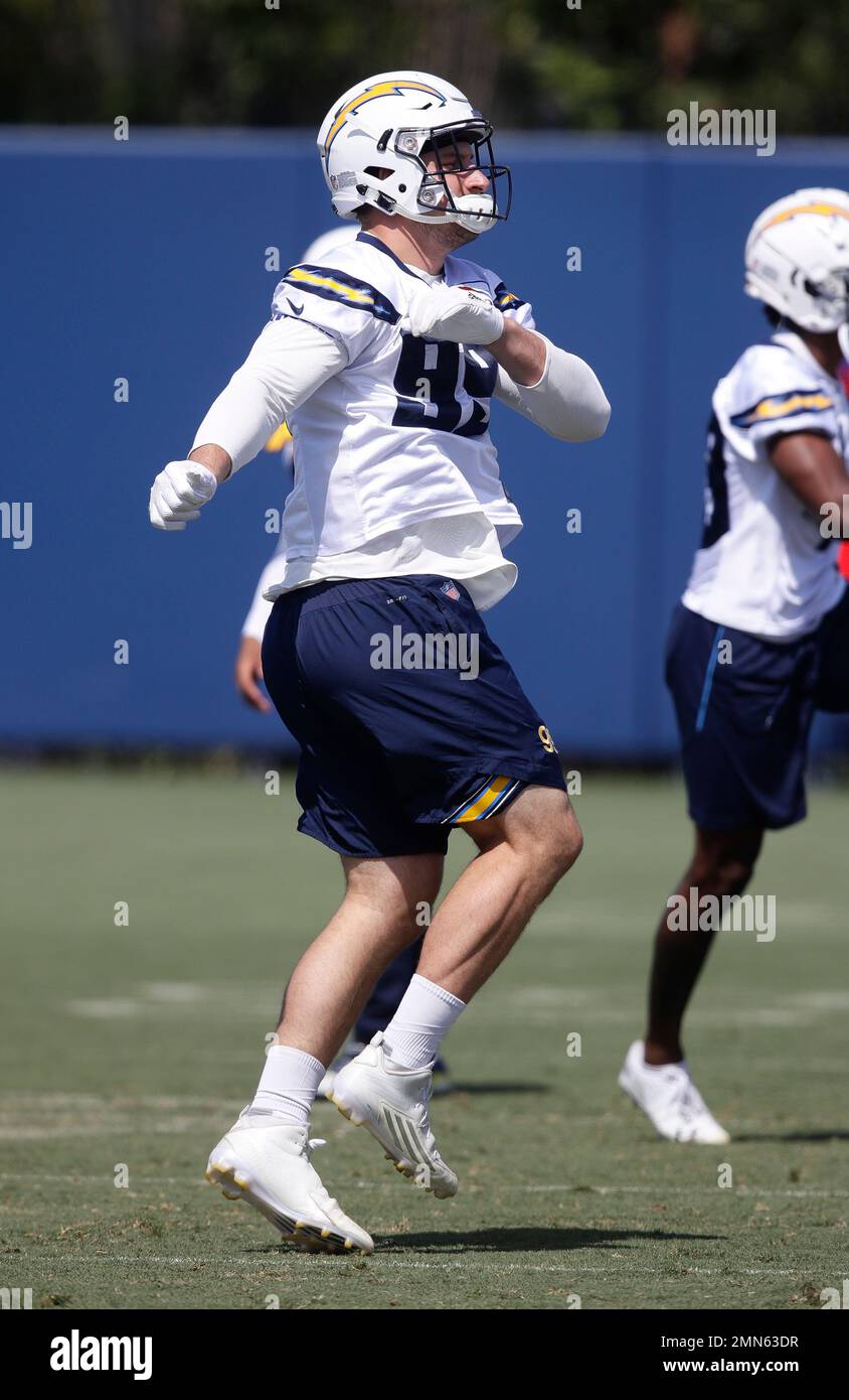 Los Angeles Chargers' Joey Bosa warms up during practice at the NFL ...