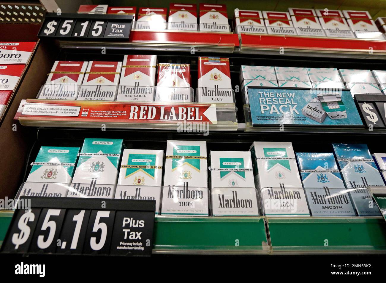 This Thursday, June 14, 2018, photo shows packs of Marlboro cigarettes ...