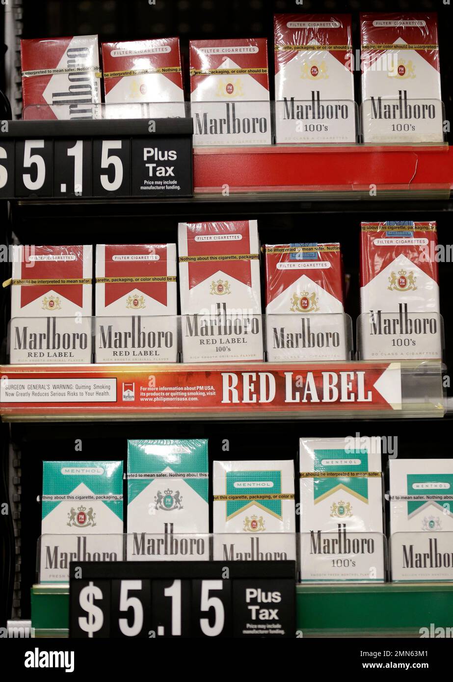 This Thursday, June 14, 2018, photo shows packs of Marlboro cigarettes ...