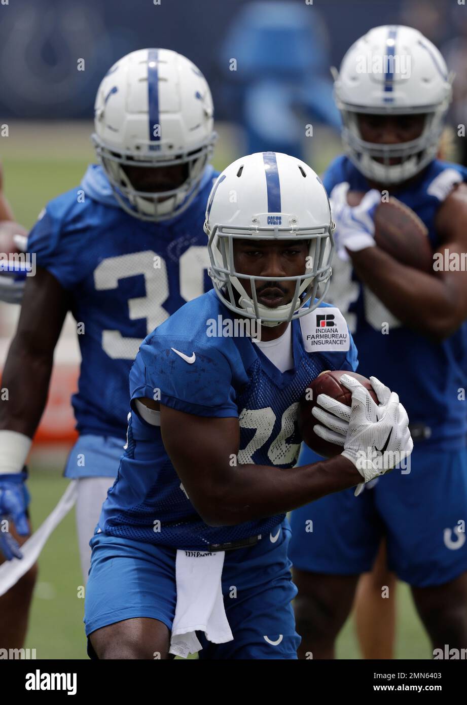 Indianapolis Colts running back Josh Ferguson runs a drill during ...