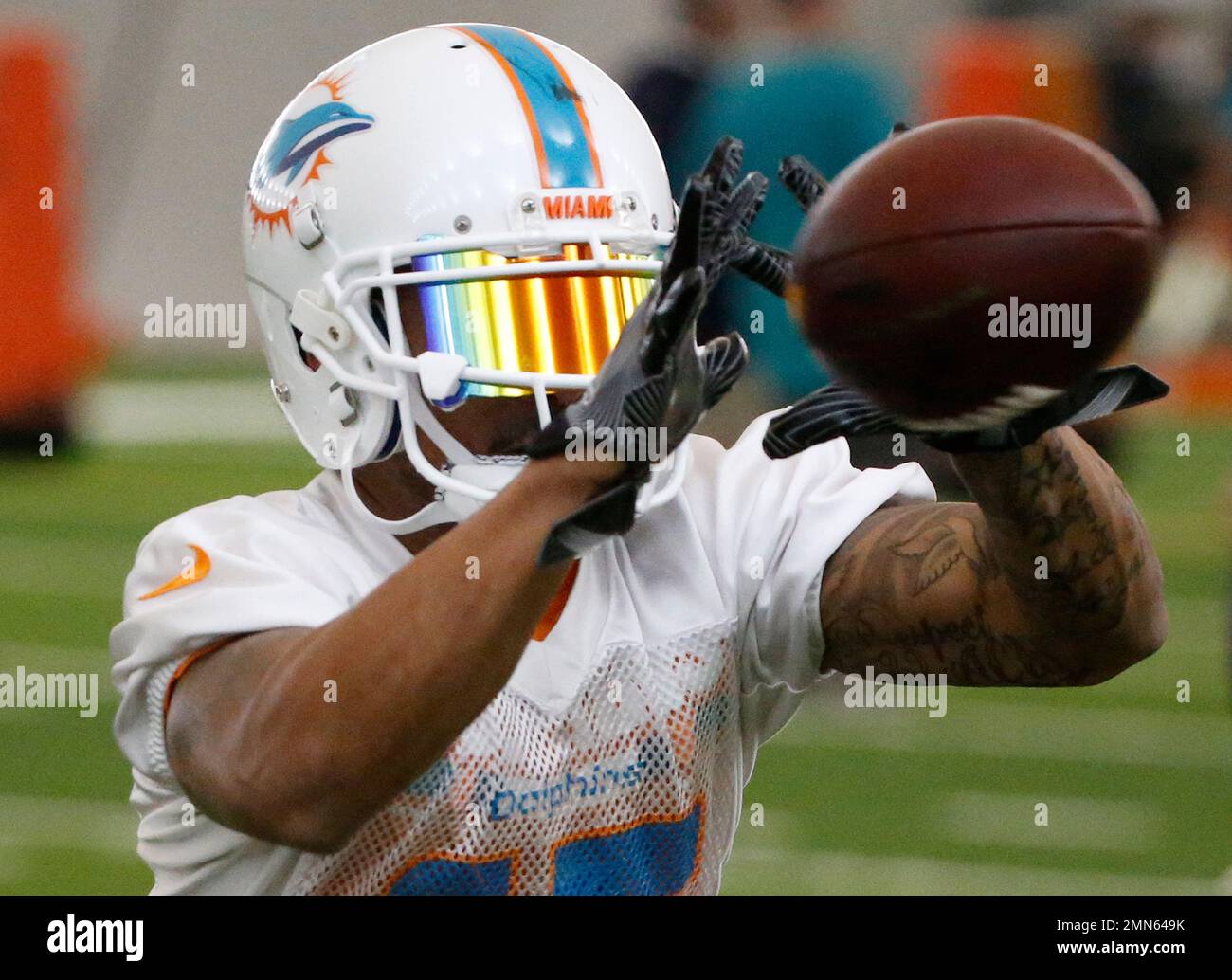 Miami Dolphins wide receiver Albert Wilson runs a drill during practice ...