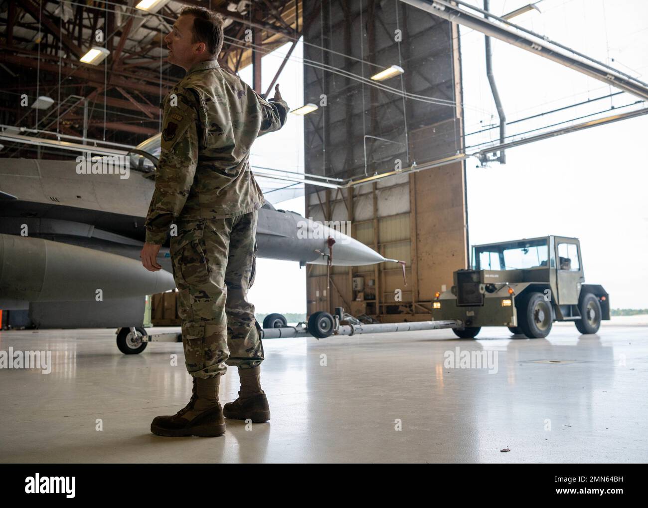 U.S. Airmen assigned to the 55th Fighter Generation Squadron stow F-16C ...