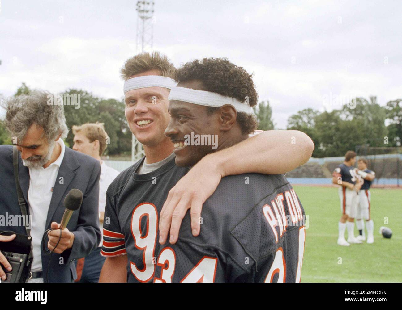 Chicago Bears quarterback Jim McMahon, left, and running back Walter ...