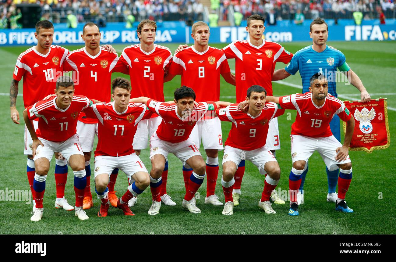 Russia's soccer team poses for photographers ahead of the group A match ...