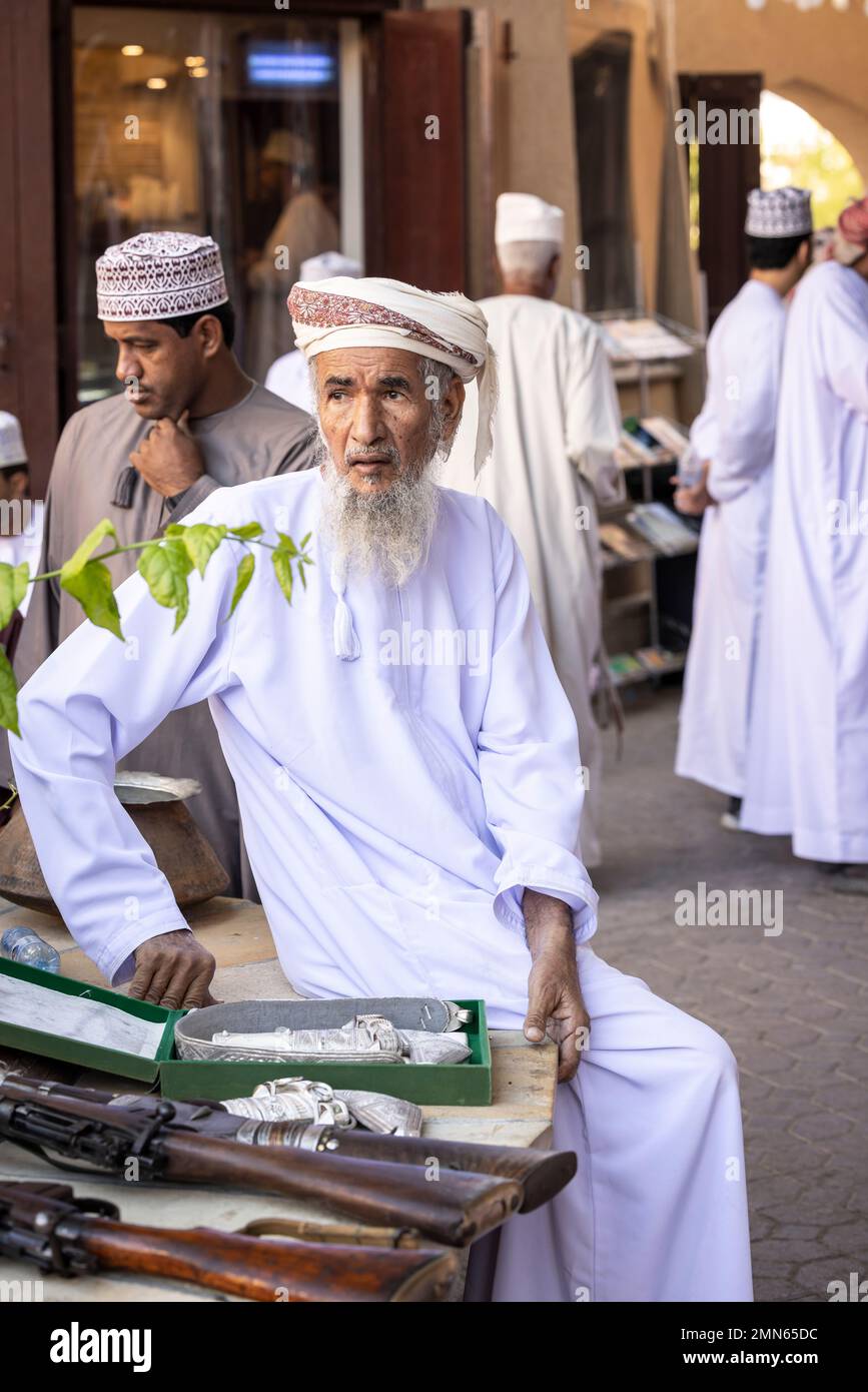 Nizwa, Oman, 2nd December 2022: omani men at the guns market Stock ...