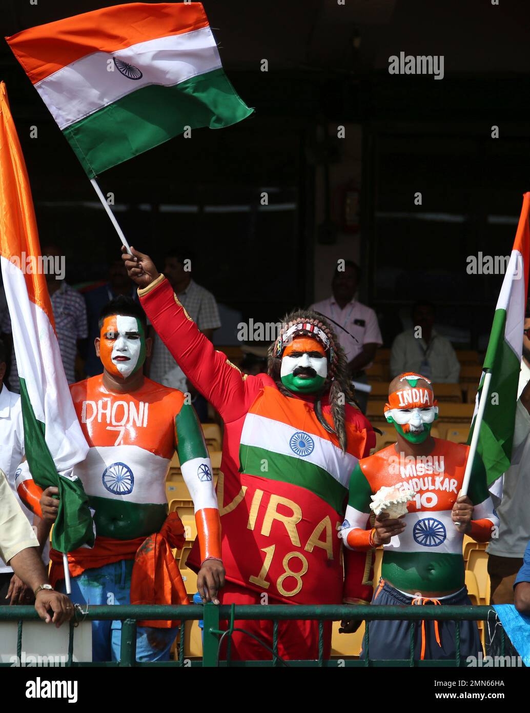 Indian cricket fans cheer for their team before the start of the one ...