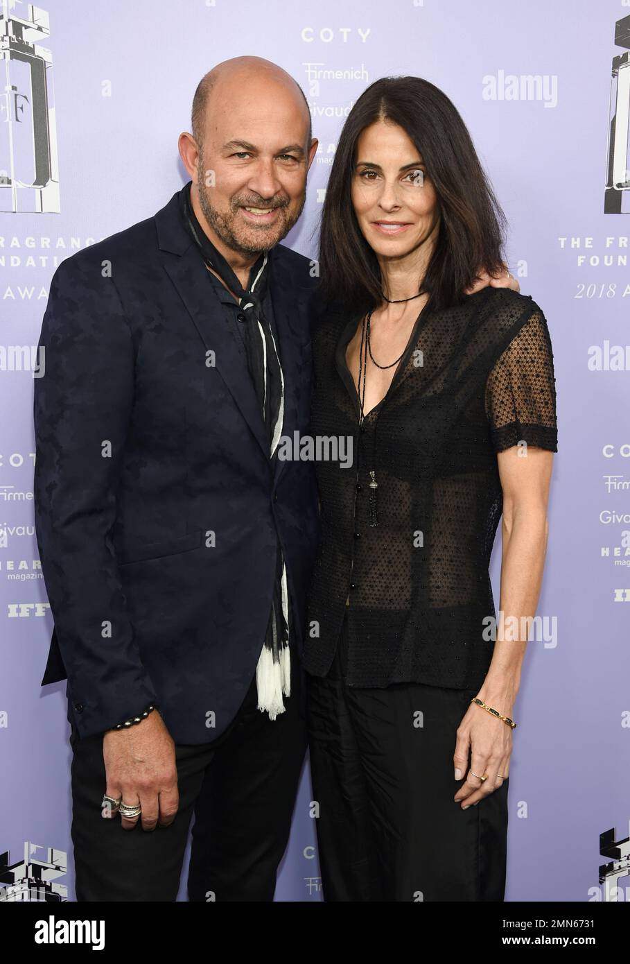 Designer John Varvatos, left, and wife Joyce Zybelberg Varvatos attend ...
