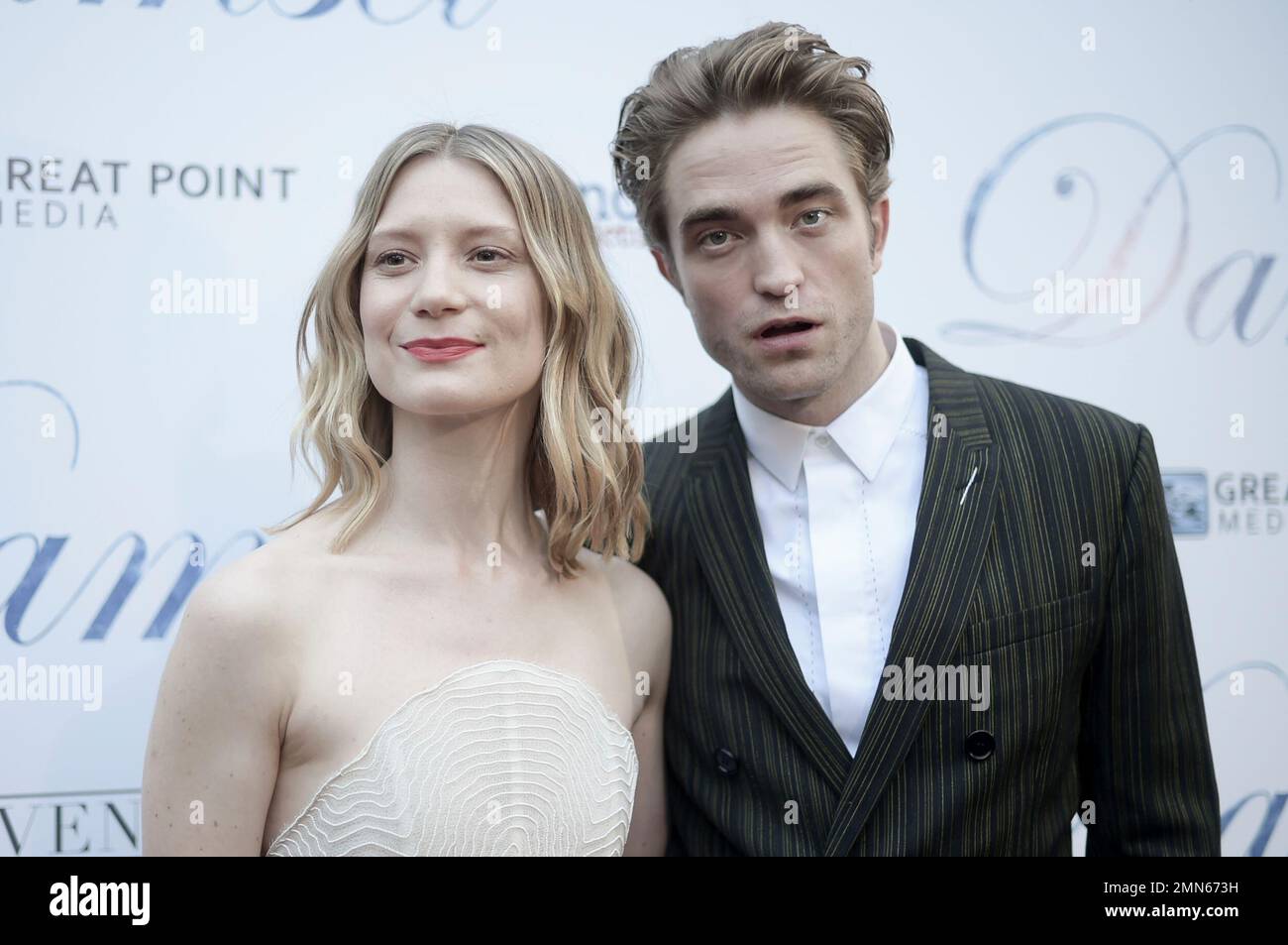 Mia Wasikowska, left, and Robert Pattinson attend the LA Premiere of ...