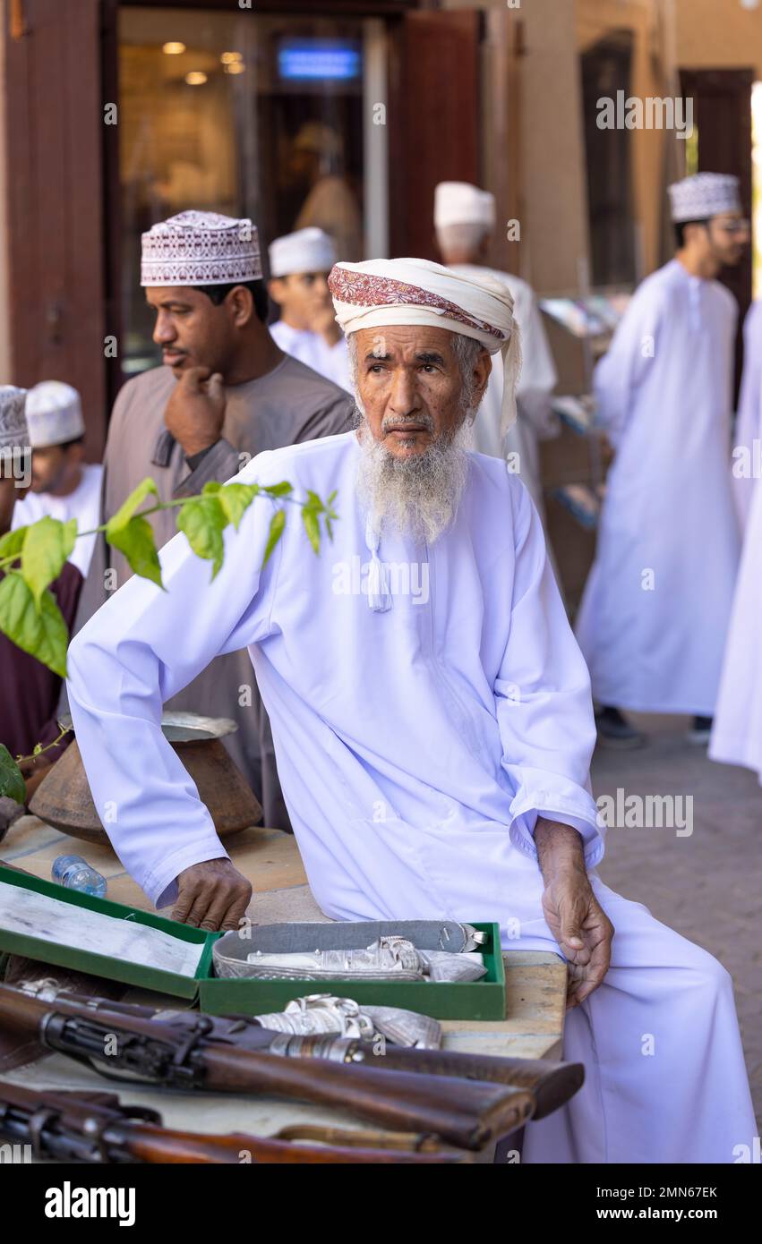 Nizwa, Oman, 2nd December 2022: omani men at the guns market Stock ...