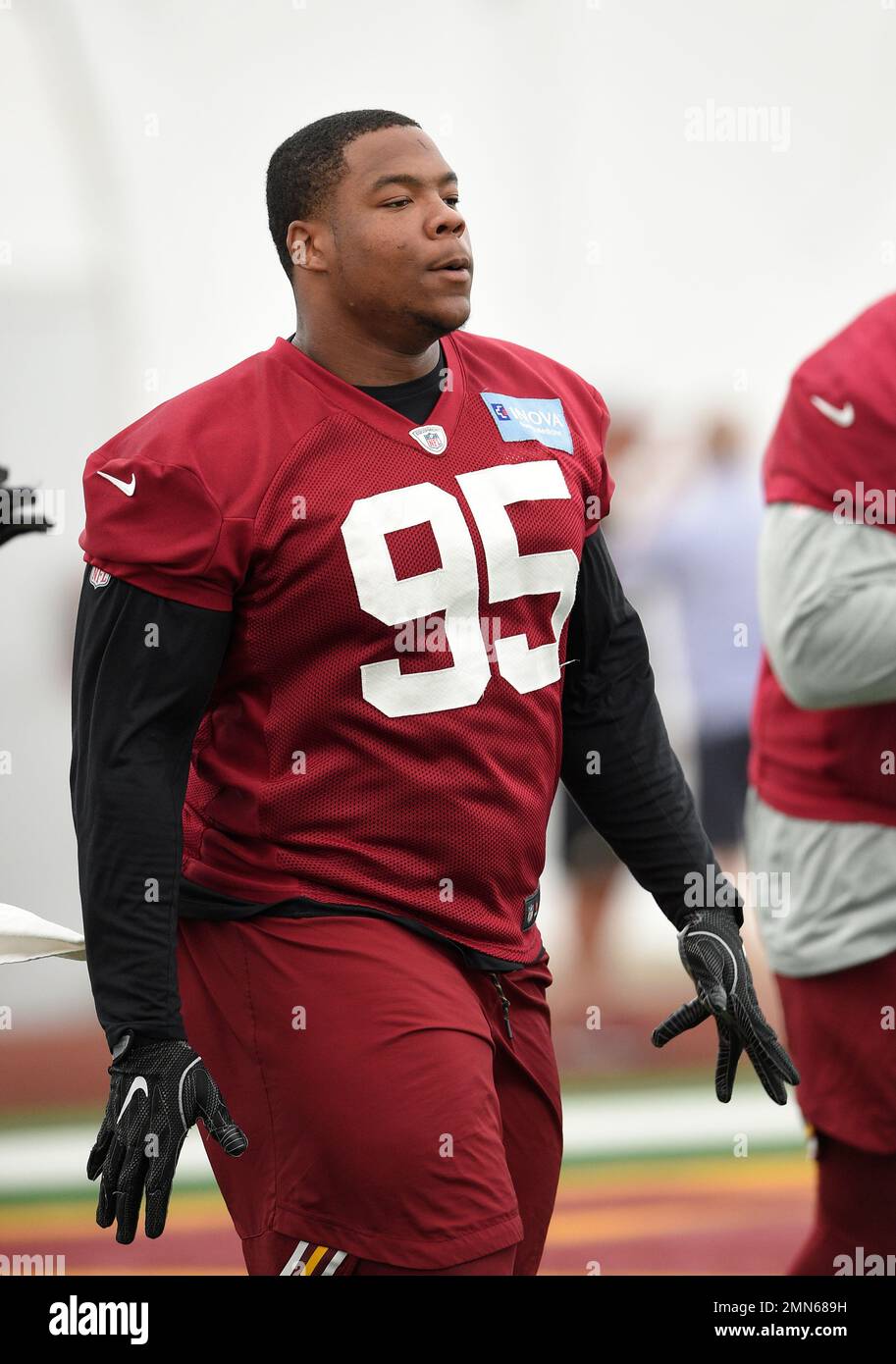 Washington Redskins defensive tackle Daron Payne (95) looks on during ...