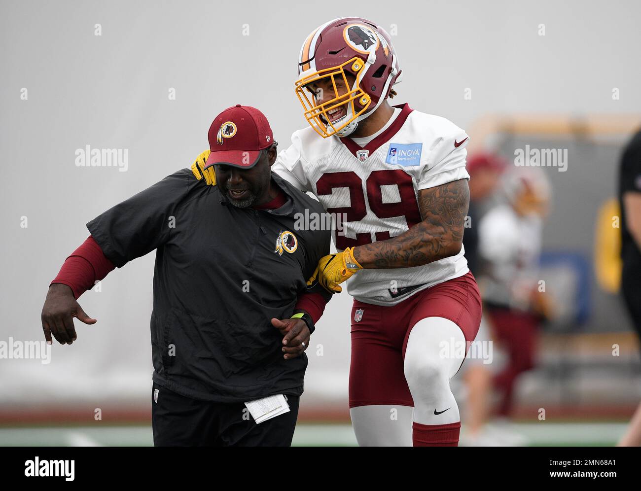 Washington Redskins running back Derrius Guice (29) jokes around with a ...