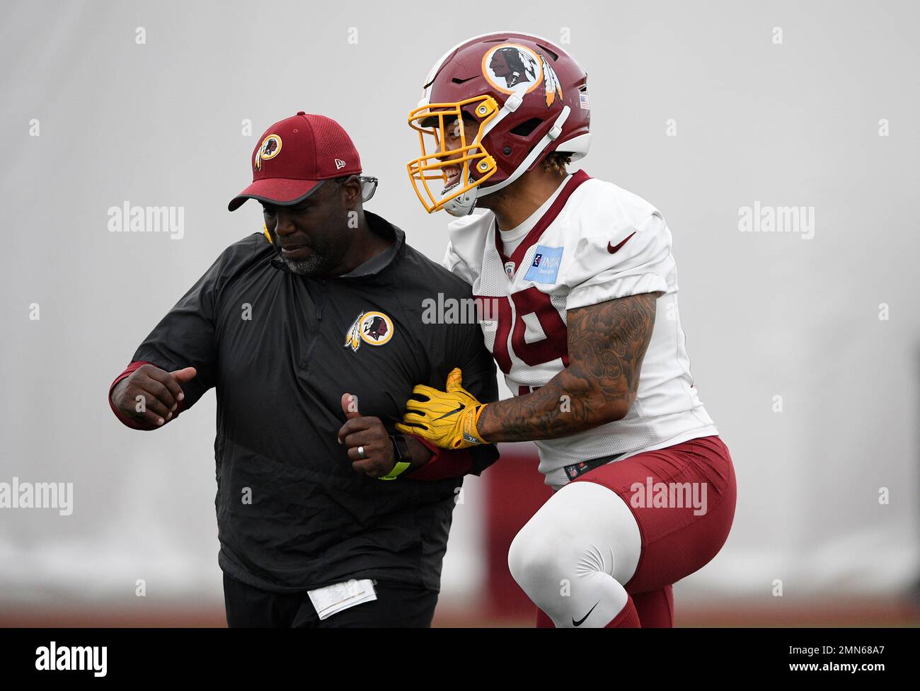 Washington Redskins running back Derrius Guice (29) jokes around with a ...
