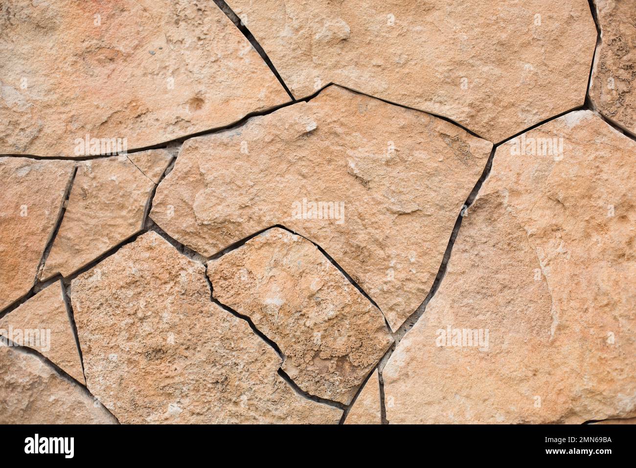 Masonry walls of natural sand color. Stone texture close-up ...