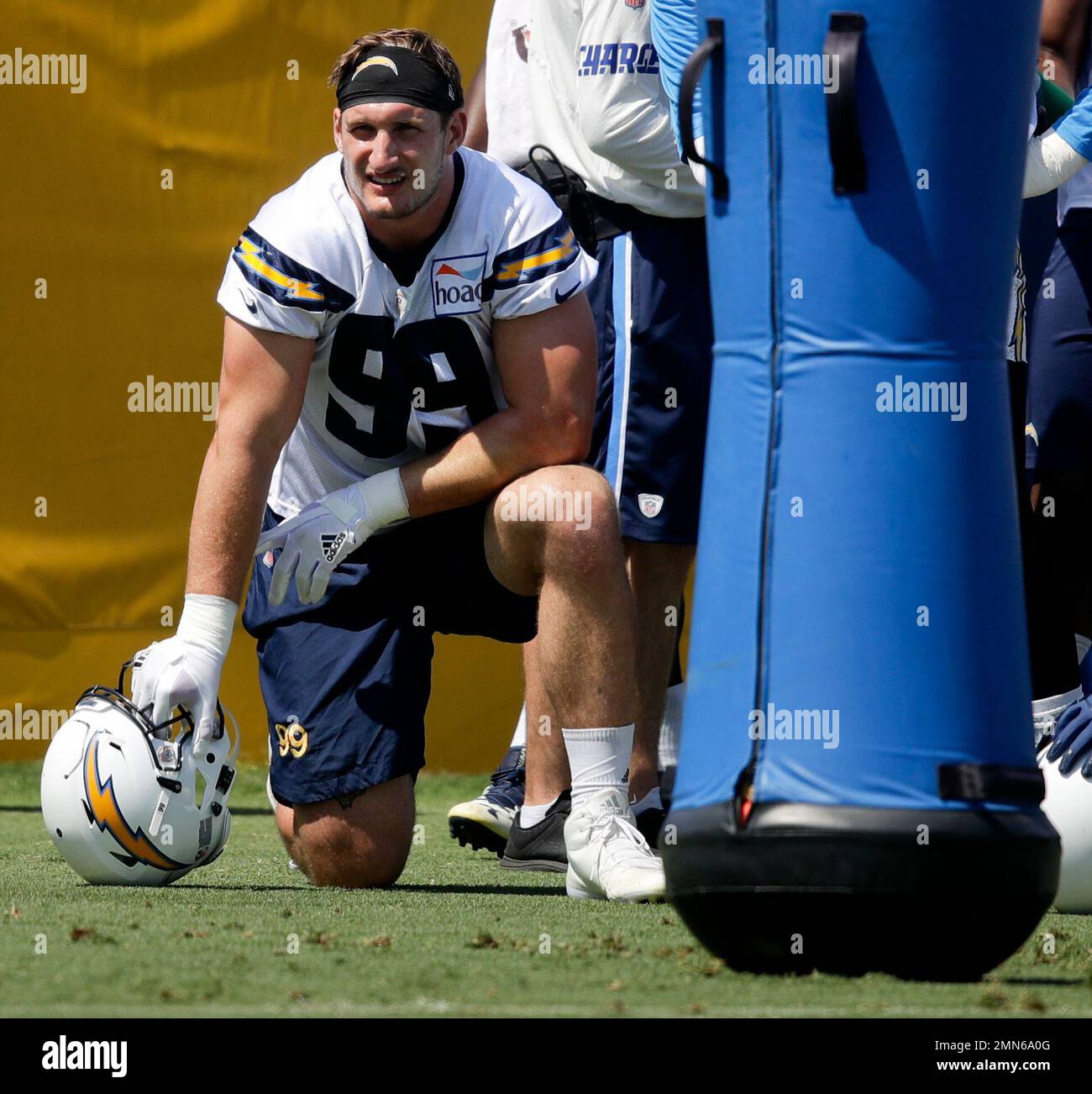 Los Angeles Chargers' Joey Bosa watches during practice at the NFL ...