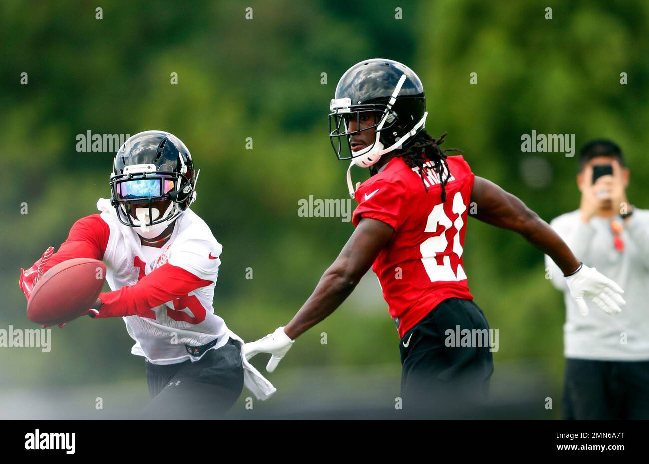 Atlanta Falcons wide receiver Reggie Davis (13) reaches for a pass ...