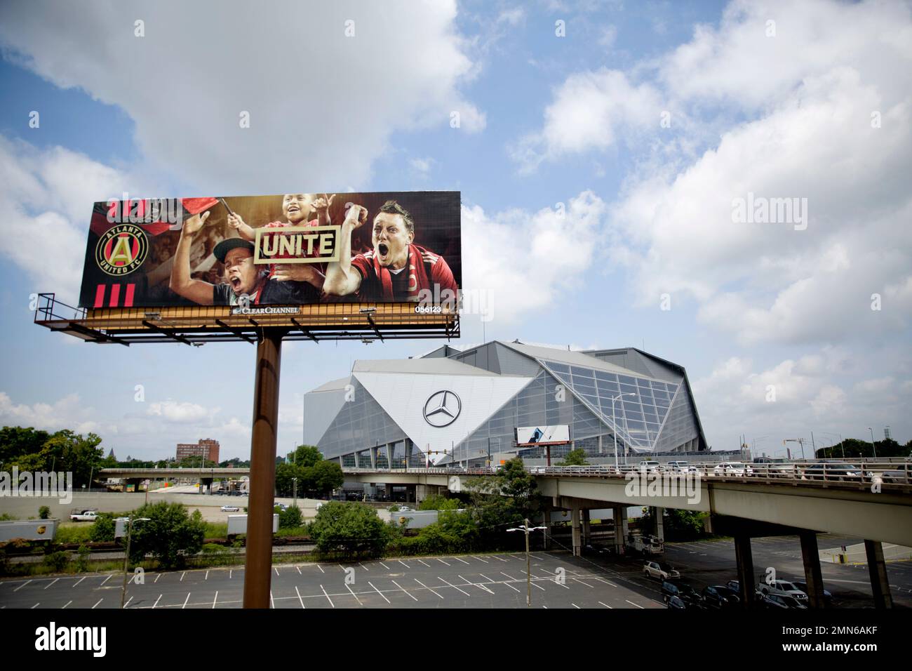 A billboard for Atlanta's MLS soccer team stands next to Mercedes-Benz ...