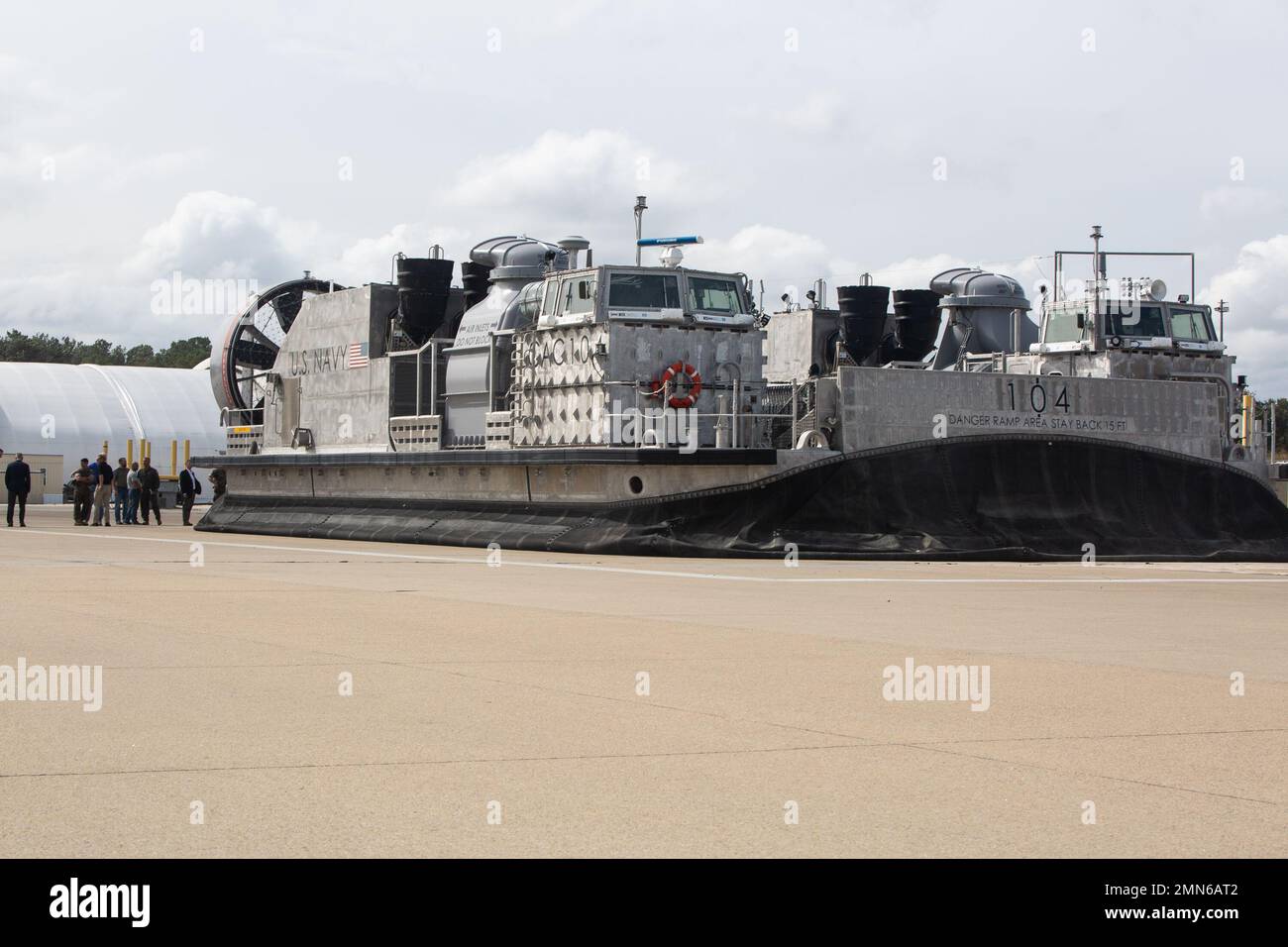 U.S. Marines and Sailors examine the new Landing Craft, Air Cushion ...