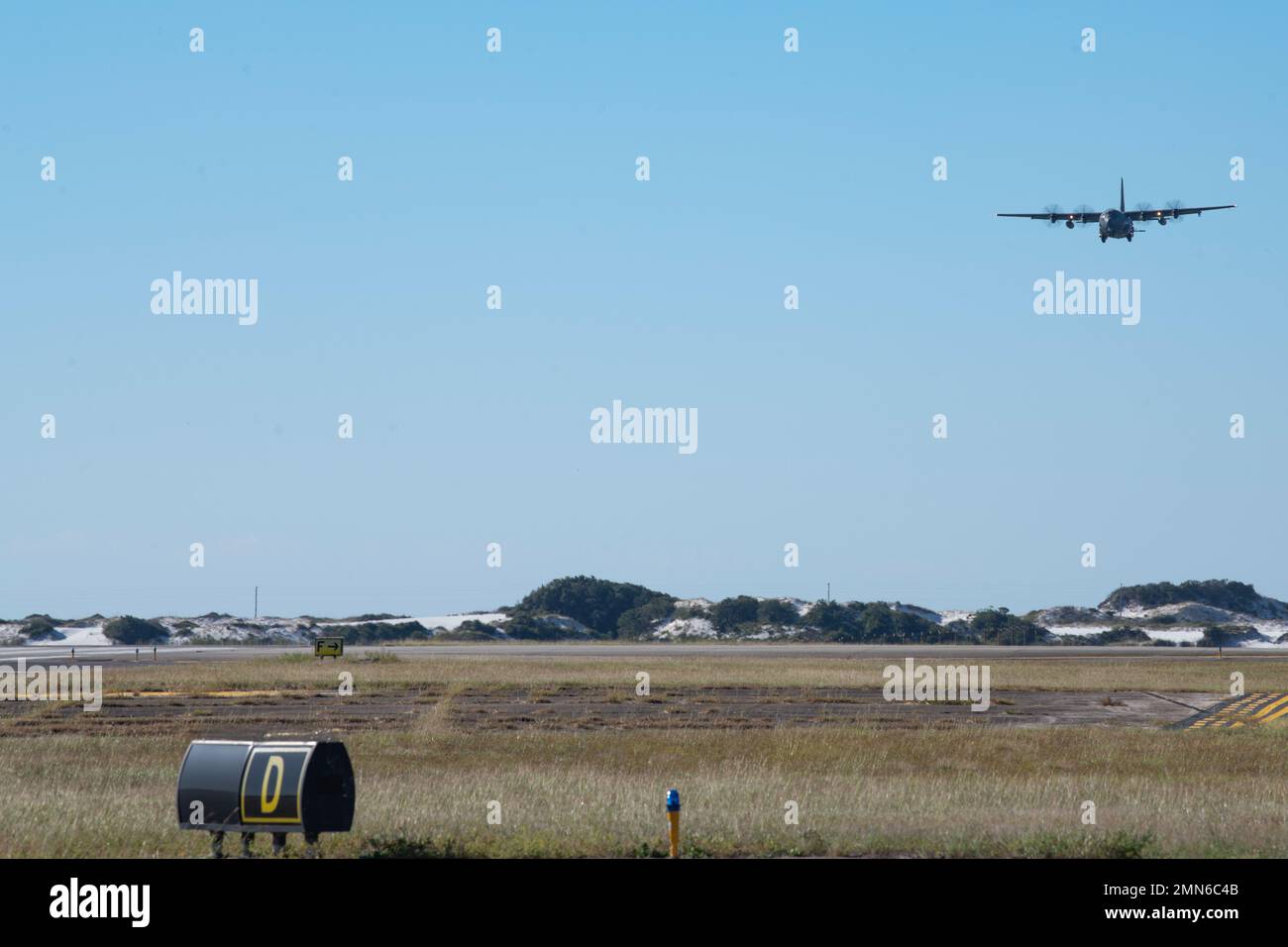 A U.S. Air Force AC-130J Ghostrider gunship prepares to land on the ...