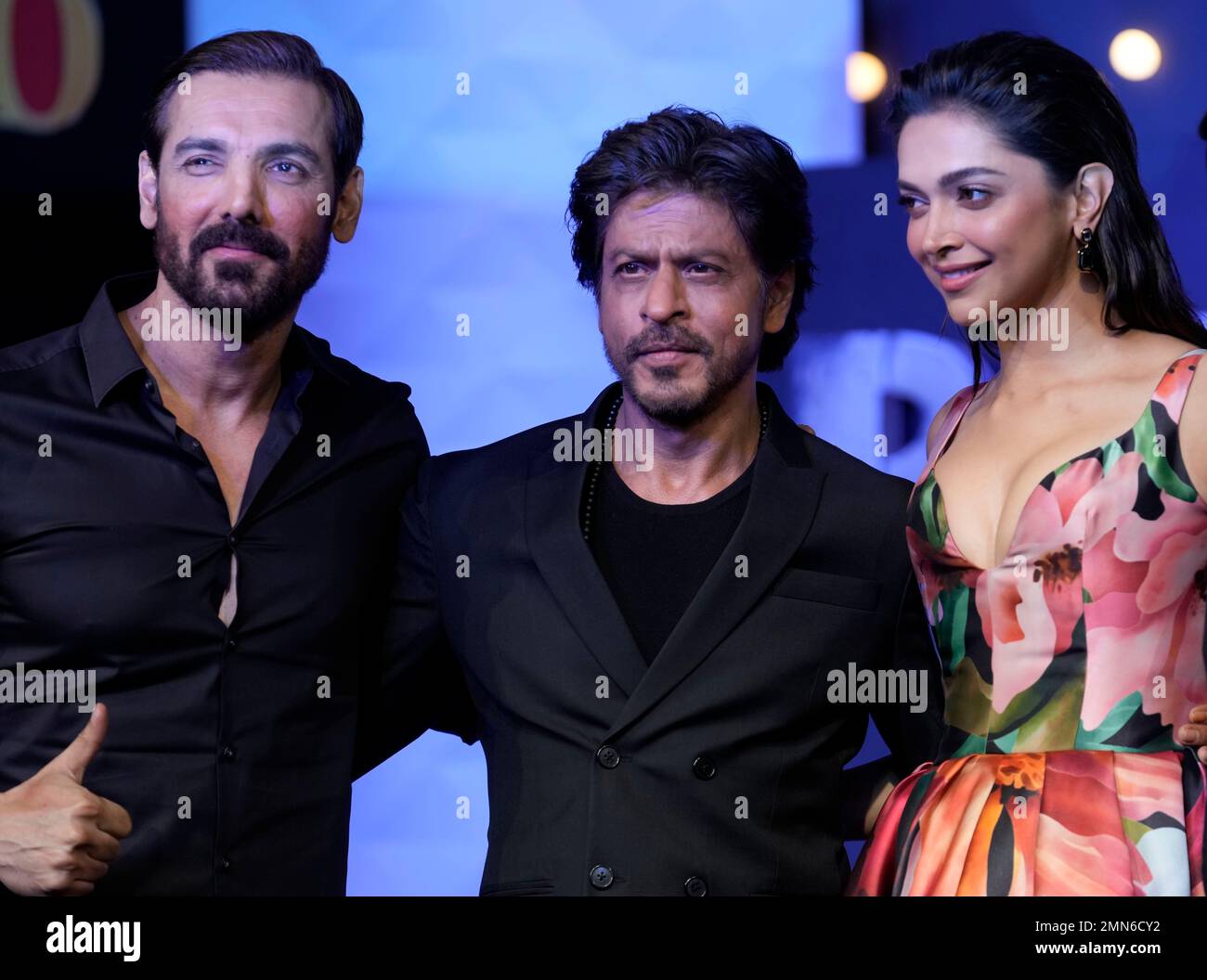 Bollywood actors from left, John Abraham, Shah Rukh Khan and Deepika Padukone pose during a ...