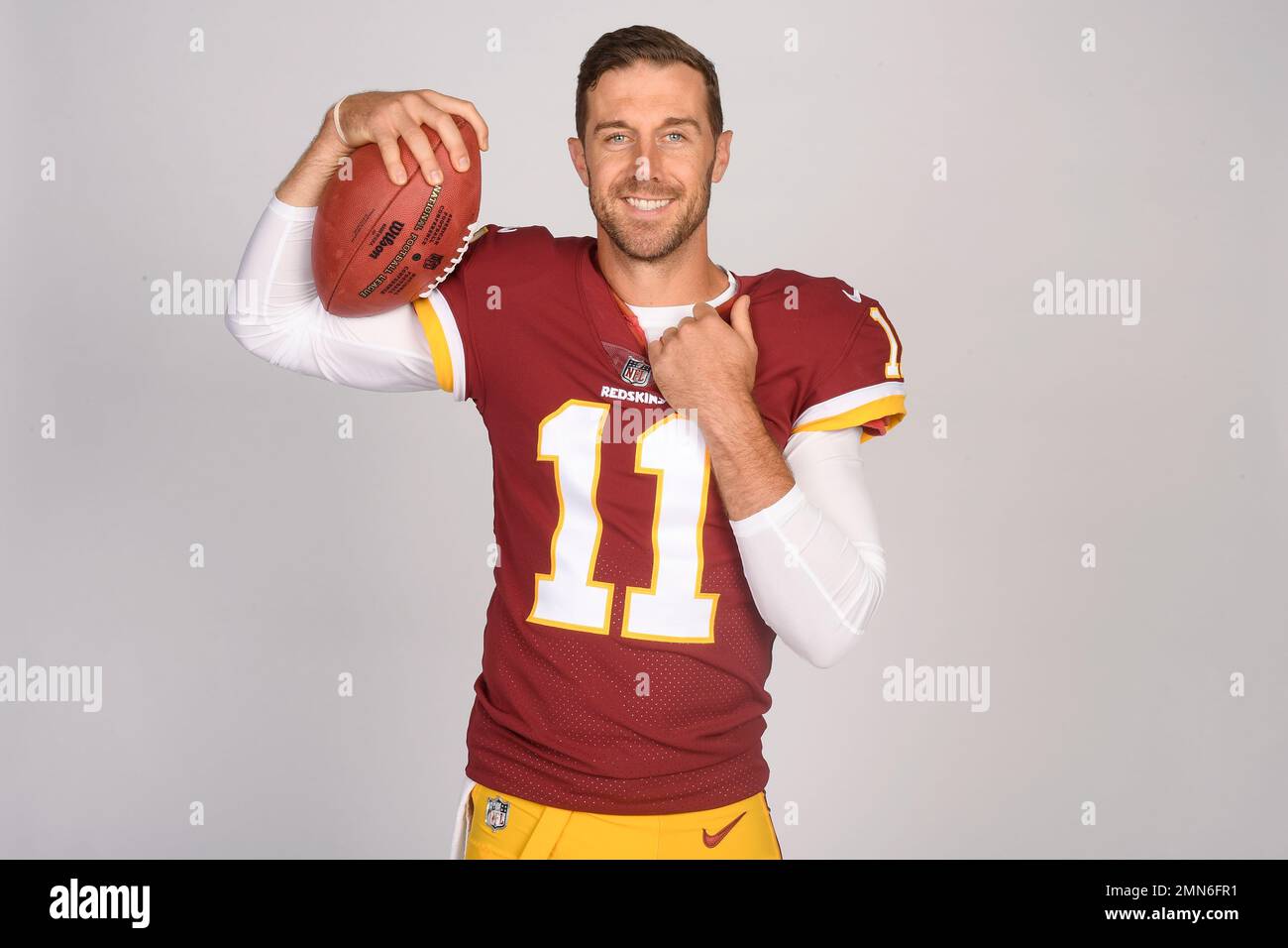 Washington Redskins quarterback Alex Smith poses for a photograph ...