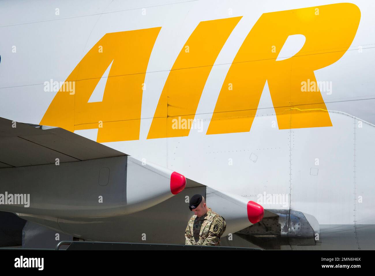 An Army soldier bows his head while a prayer is said after the transfer ...