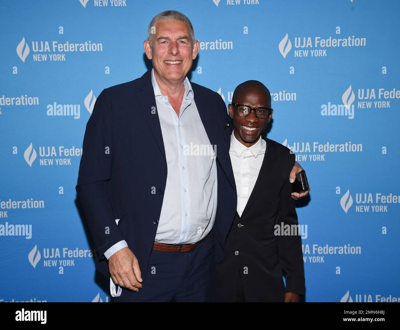 Music executive Lyor Cohen, left, poses with honoree Troy Carter ...