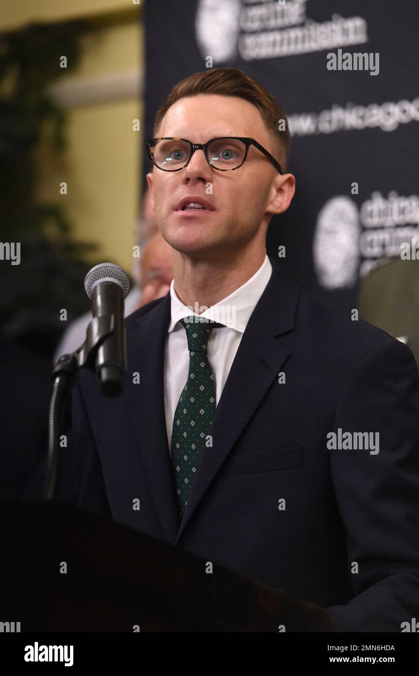 Andrew Henning speaks at a press conference for "The Gang Book ...