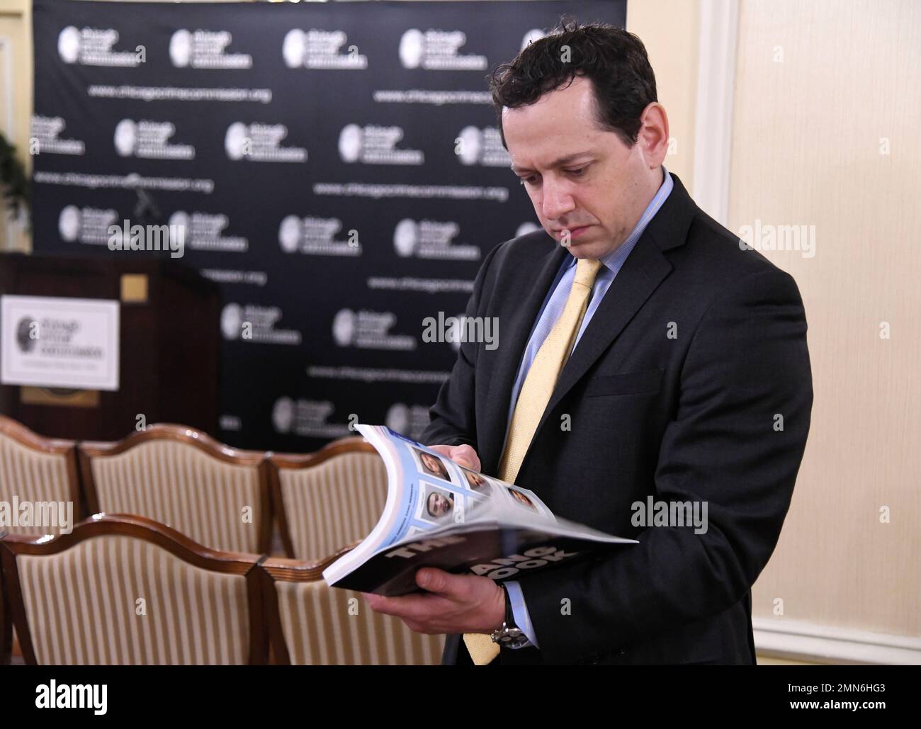 Steven Block looks through "The Gang Book," Tuesday, June 12, 2018, in ...