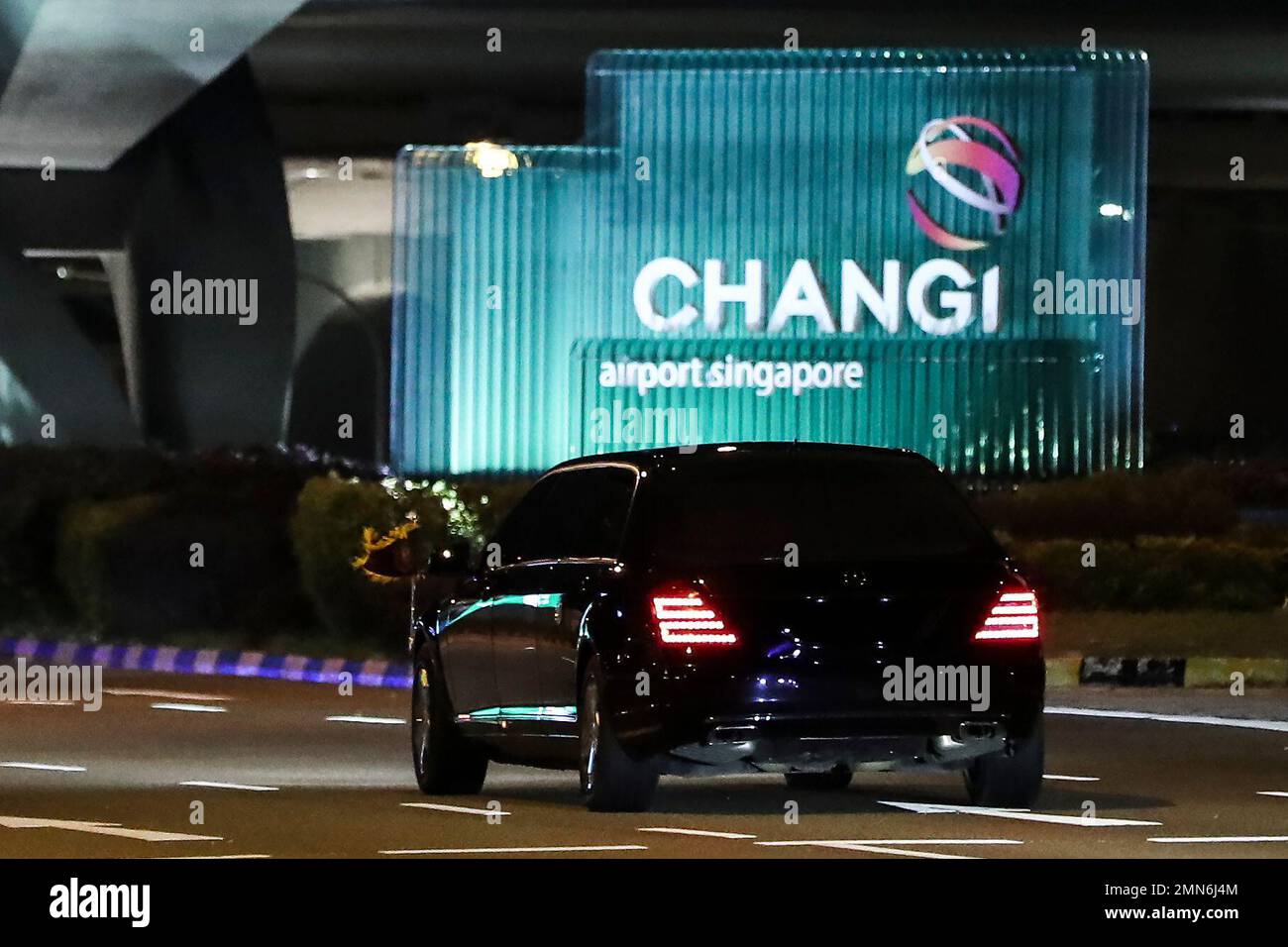 The motorcade of North Korea leader Kim Jong Un arrives at Changi ...